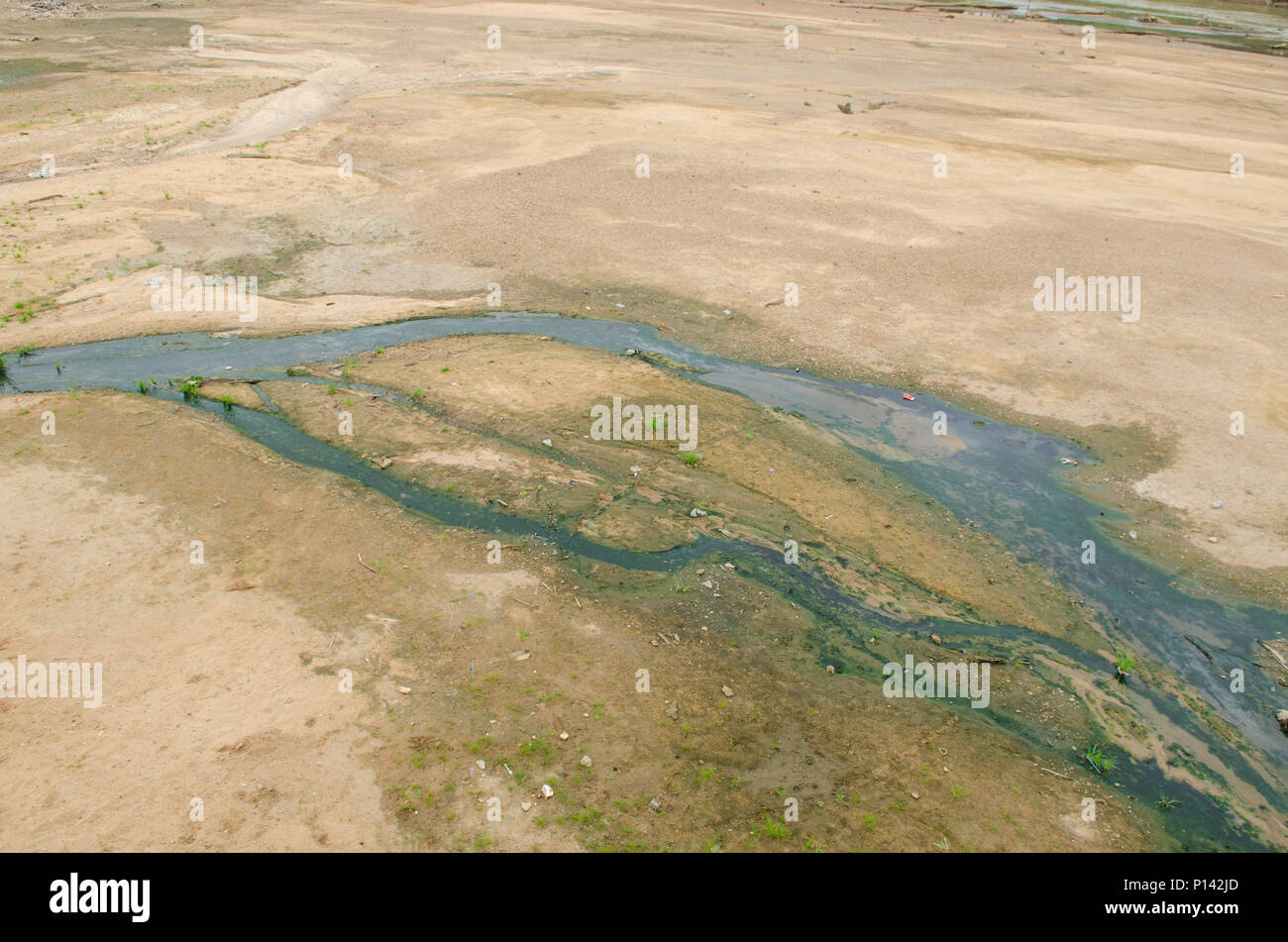 Meandering brook is running over pebbles Stock Photo - Alamy