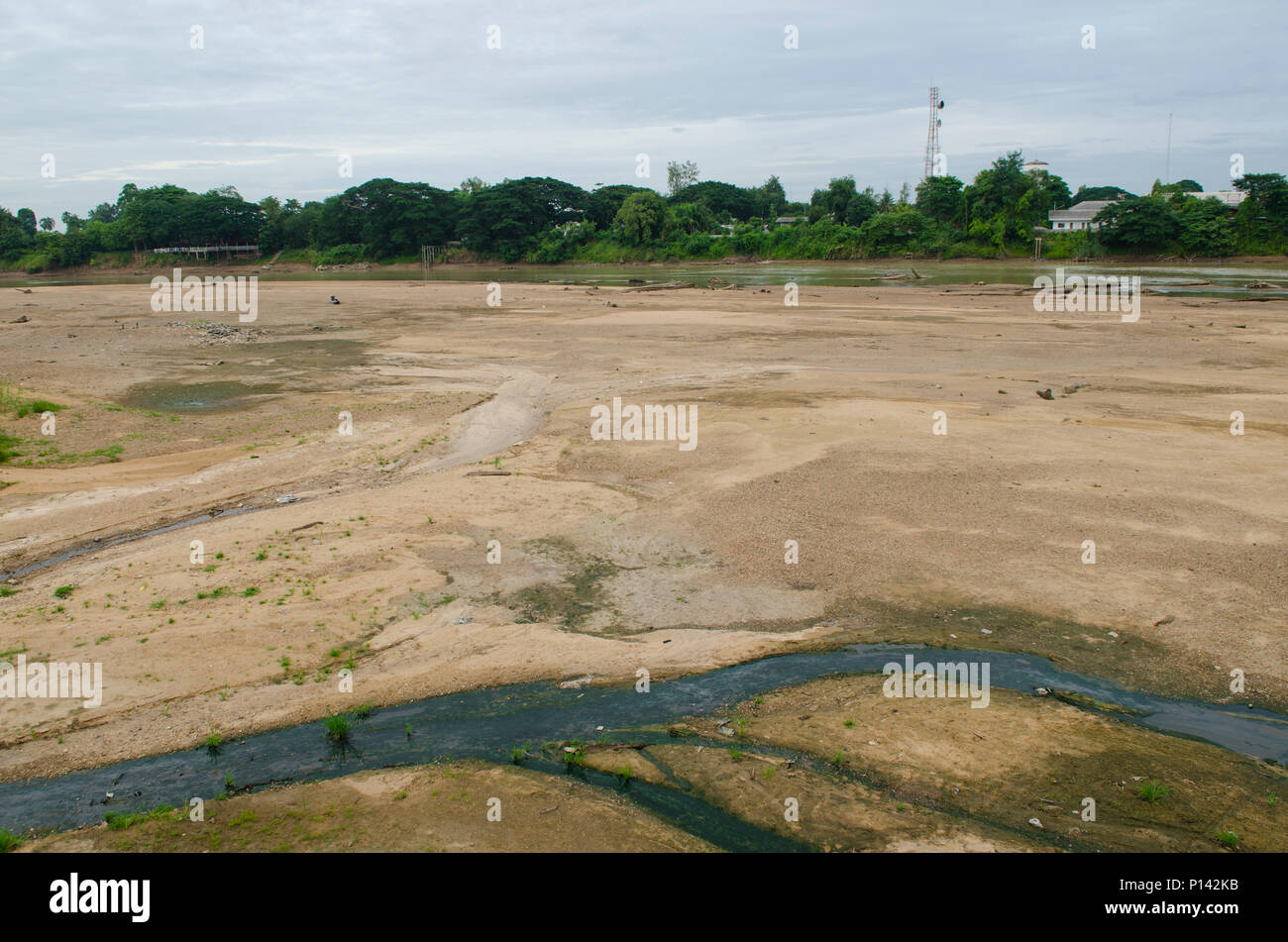 Meandering brook is running over pebbles Stock Photo - Alamy