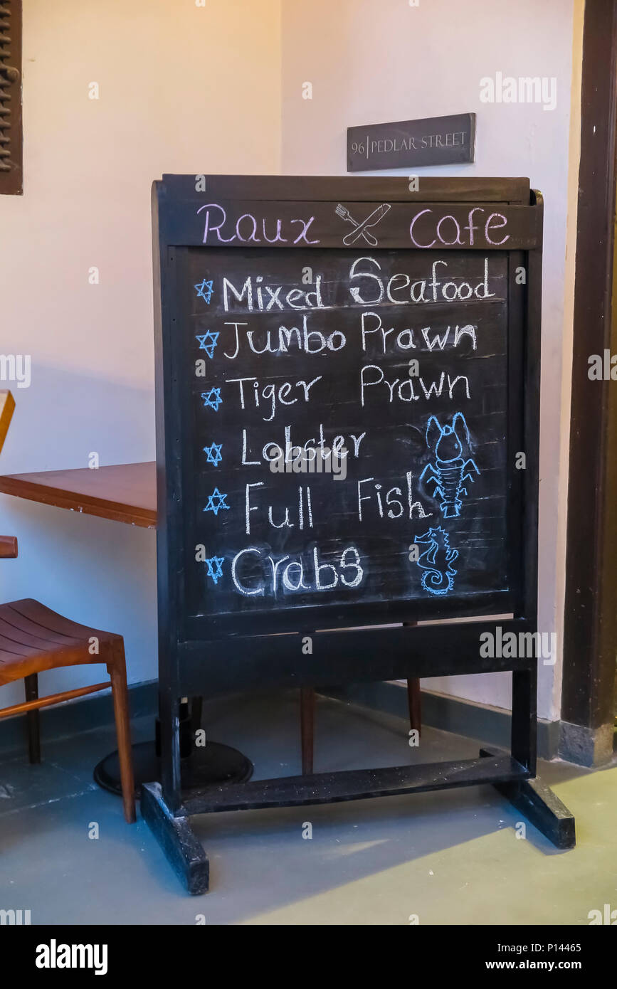 Seafood restaurant menu blackboard sign outside Raux Cafe, Pedlar ...
