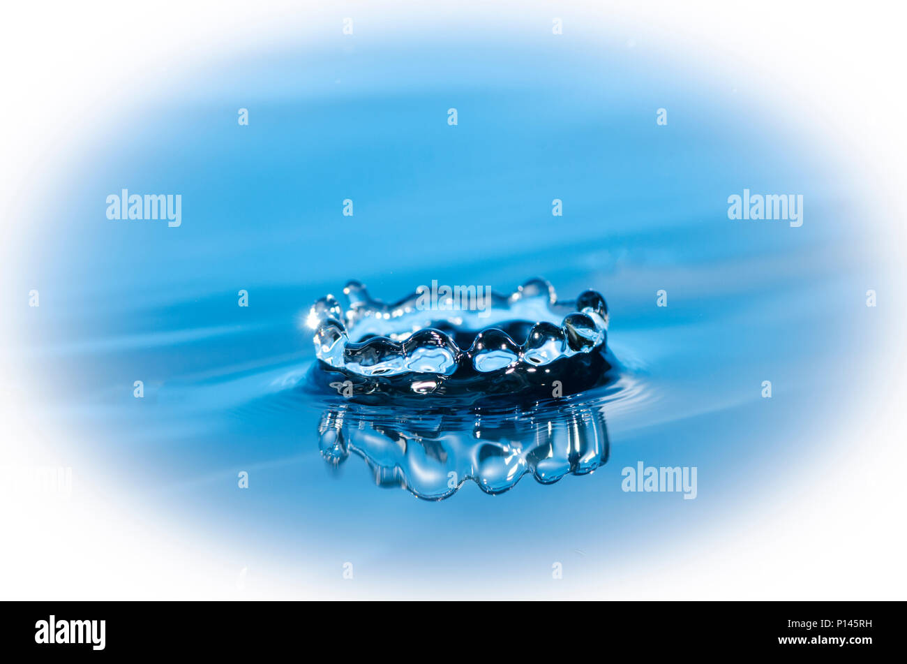 blue water splashing isolated on white background Stock Photo - Alamy