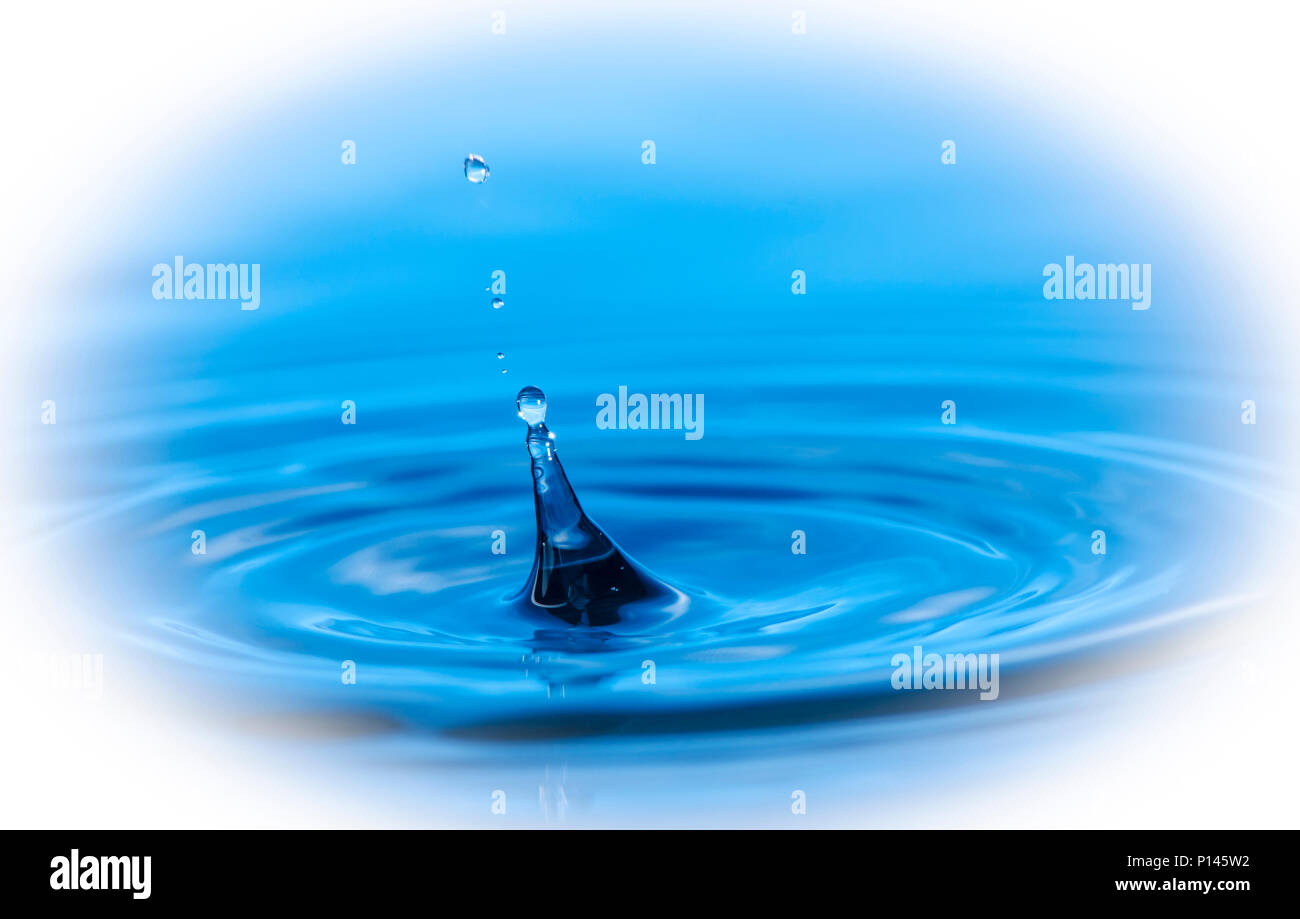 blue water splashing isolated on white background Stock Photo - Alamy