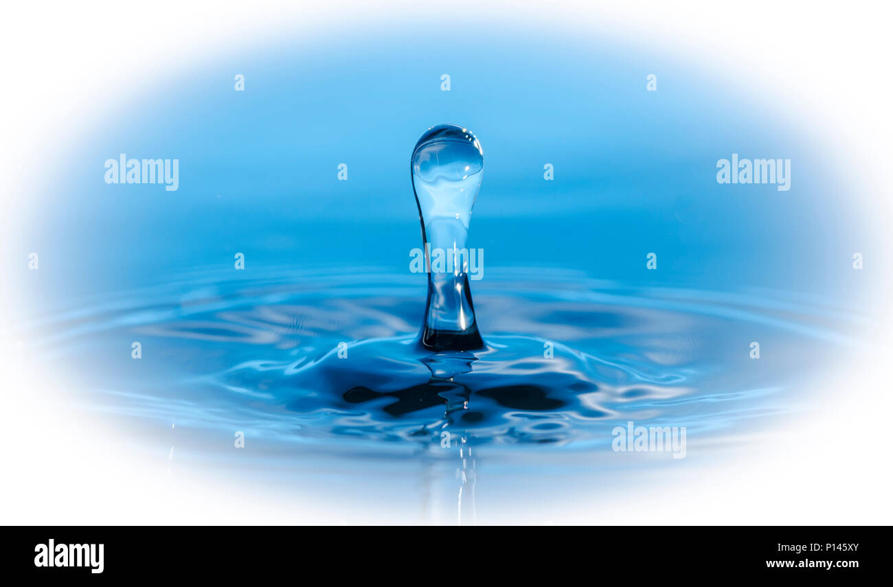 blue water splashing isolated on white background Stock Photo - Alamy