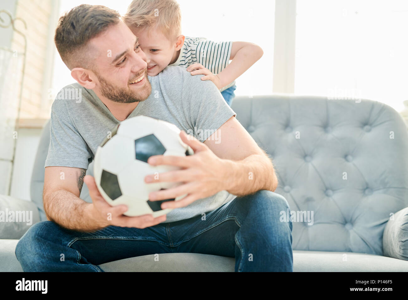 Smiling dad football hi-res stock photography and images - Alamy