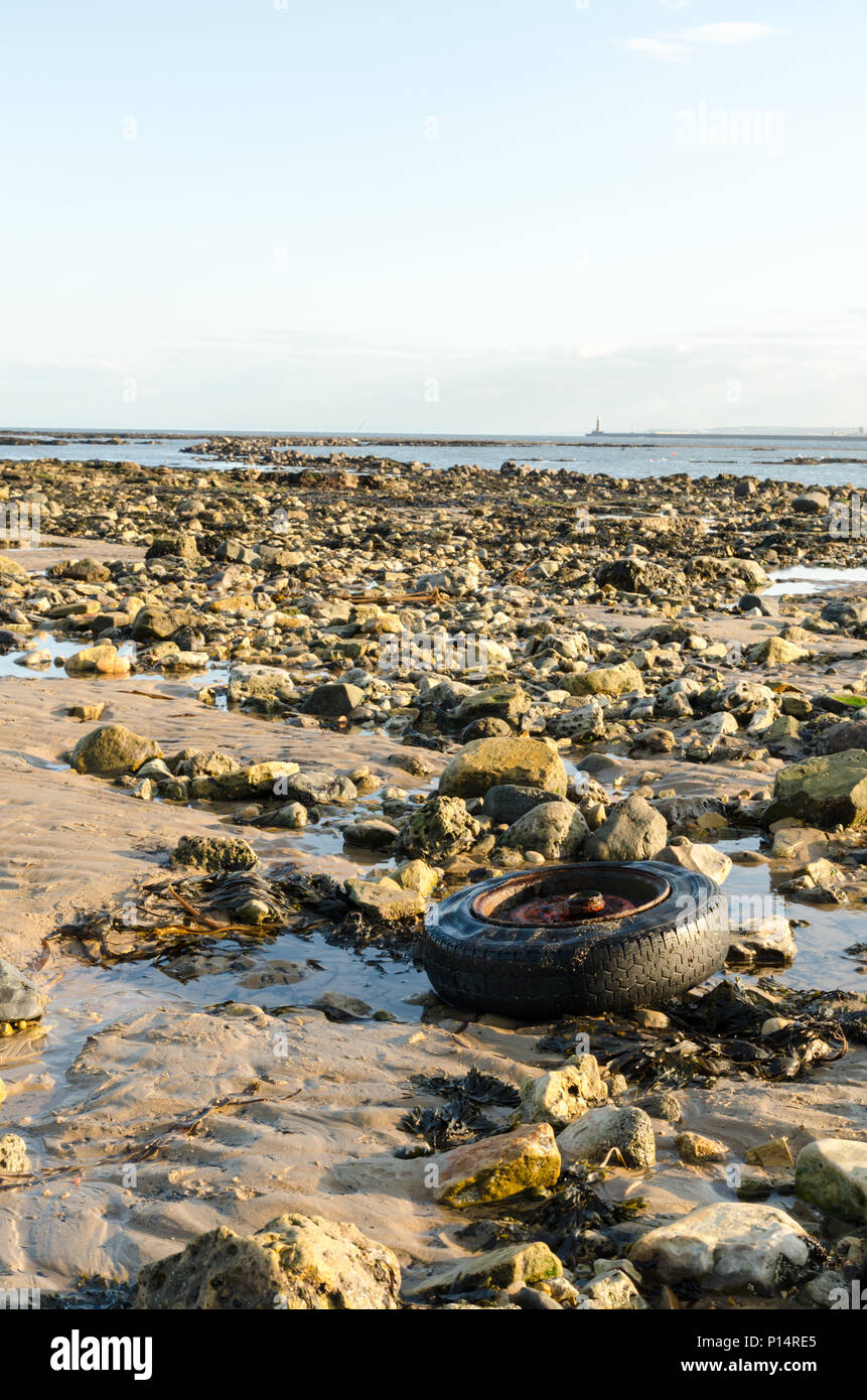 Whitburn rocks abandoned tyre hi-res stock photography and images - Alamy