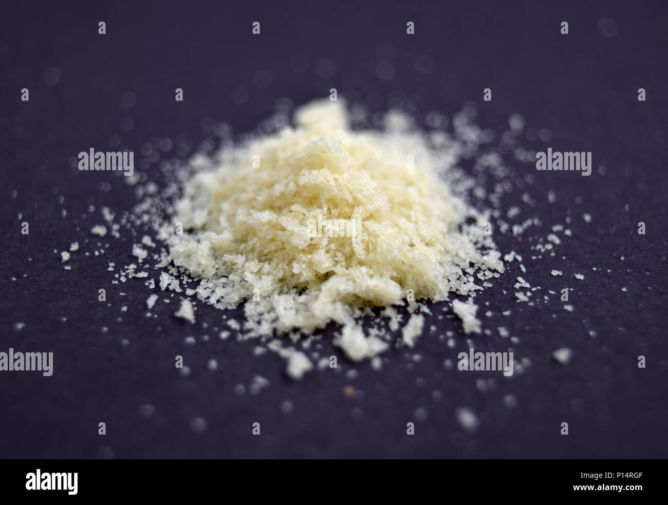 Macro of panko breadcrumbs on black background - isolated Stock Photo ...