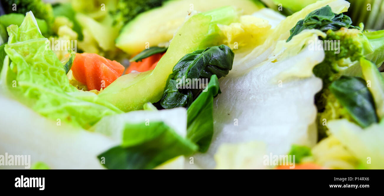 Closeup of steamed green vegetables. Healthy vegetable texture or ...
