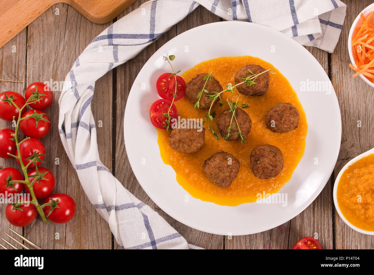 Meatballs with carrot purée Stock Photo - Alamy