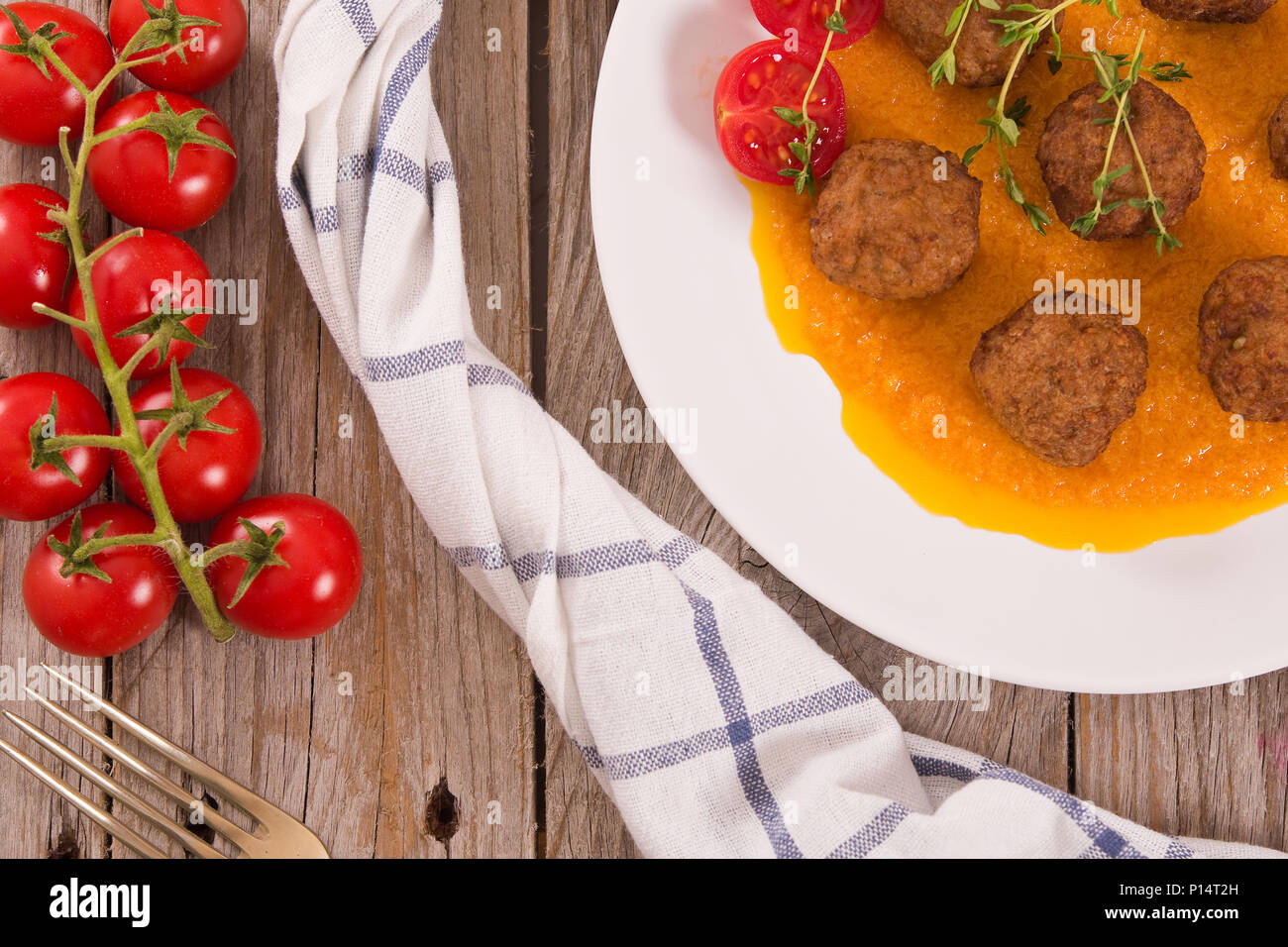 Meatballs with carrot purée Stock Photo - Alamy