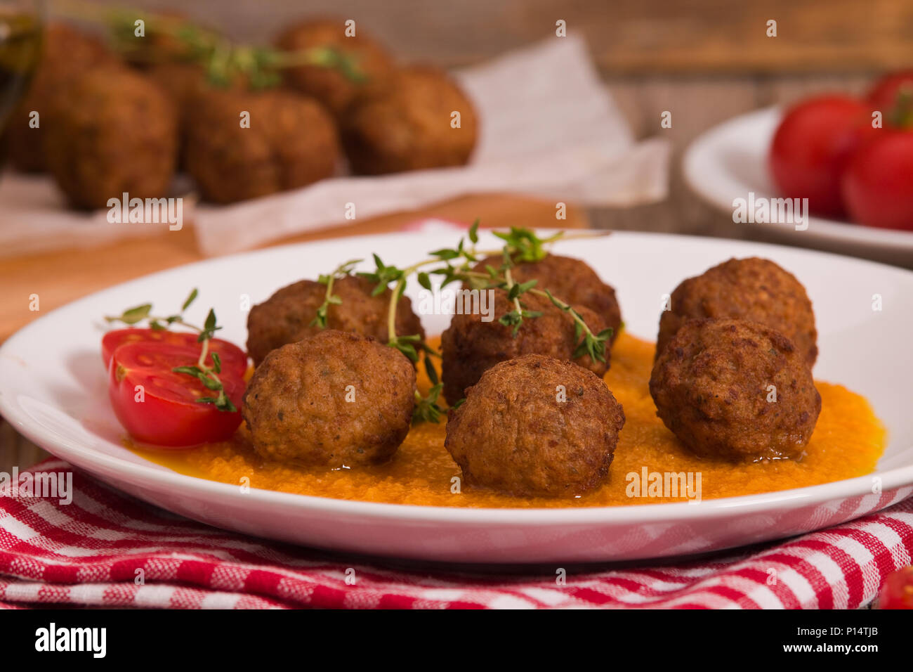Meatballs with carrot purée Stock Photo - Alamy