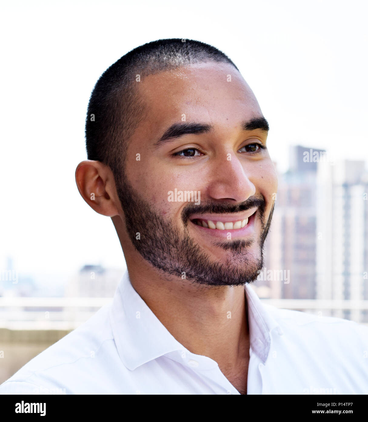 Smiling happy handsome latino man outside - head shot portrait Stock ...
