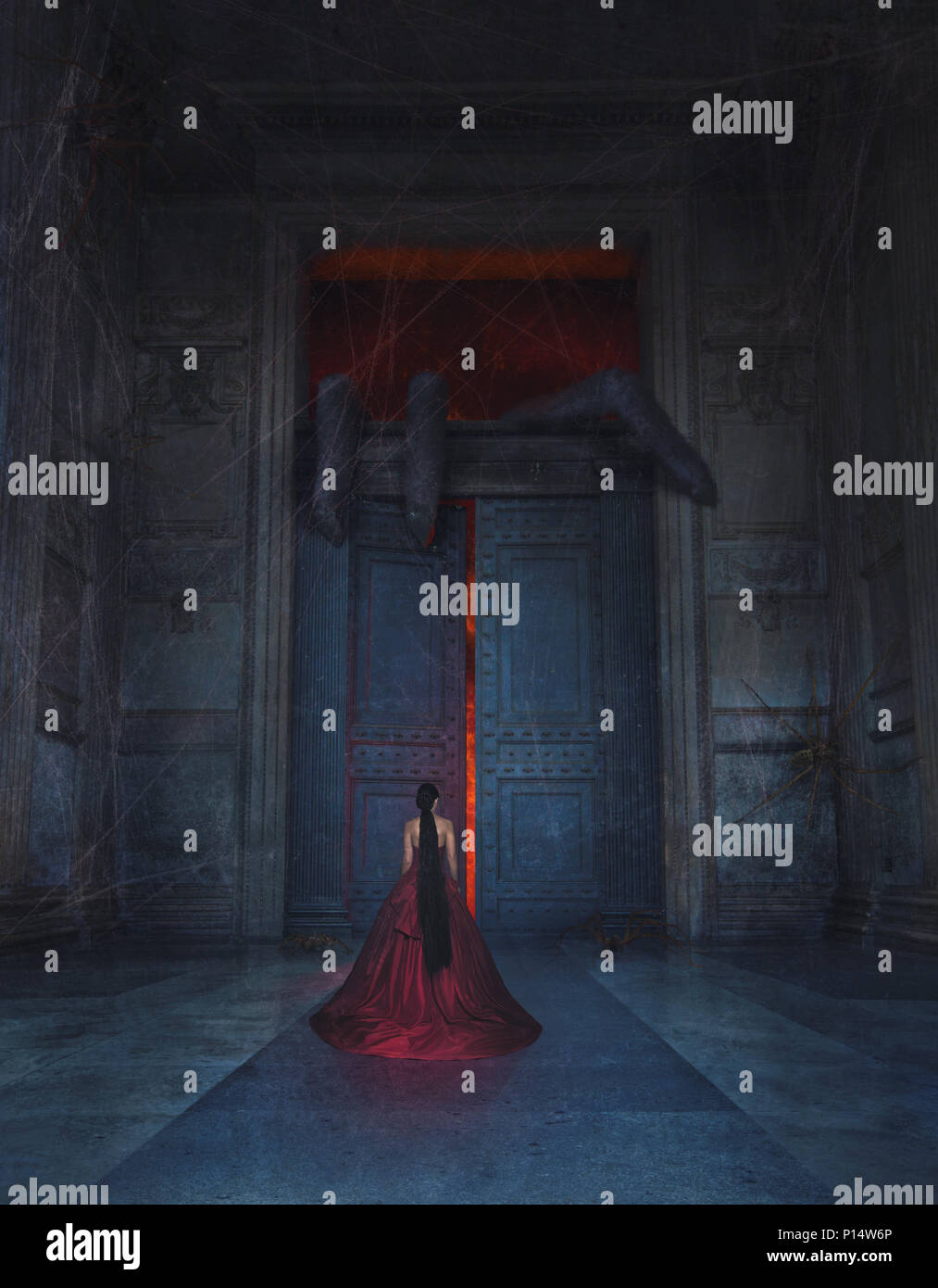 Woman in front of gates guarded by huge spider Stock Photo - Alamy