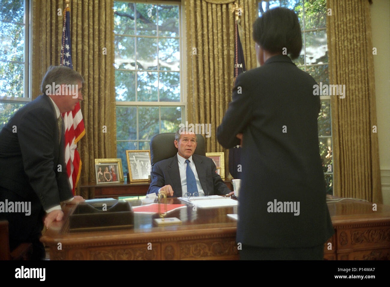 President George W Bush Meets With Andy Card And Condoleezza Rice