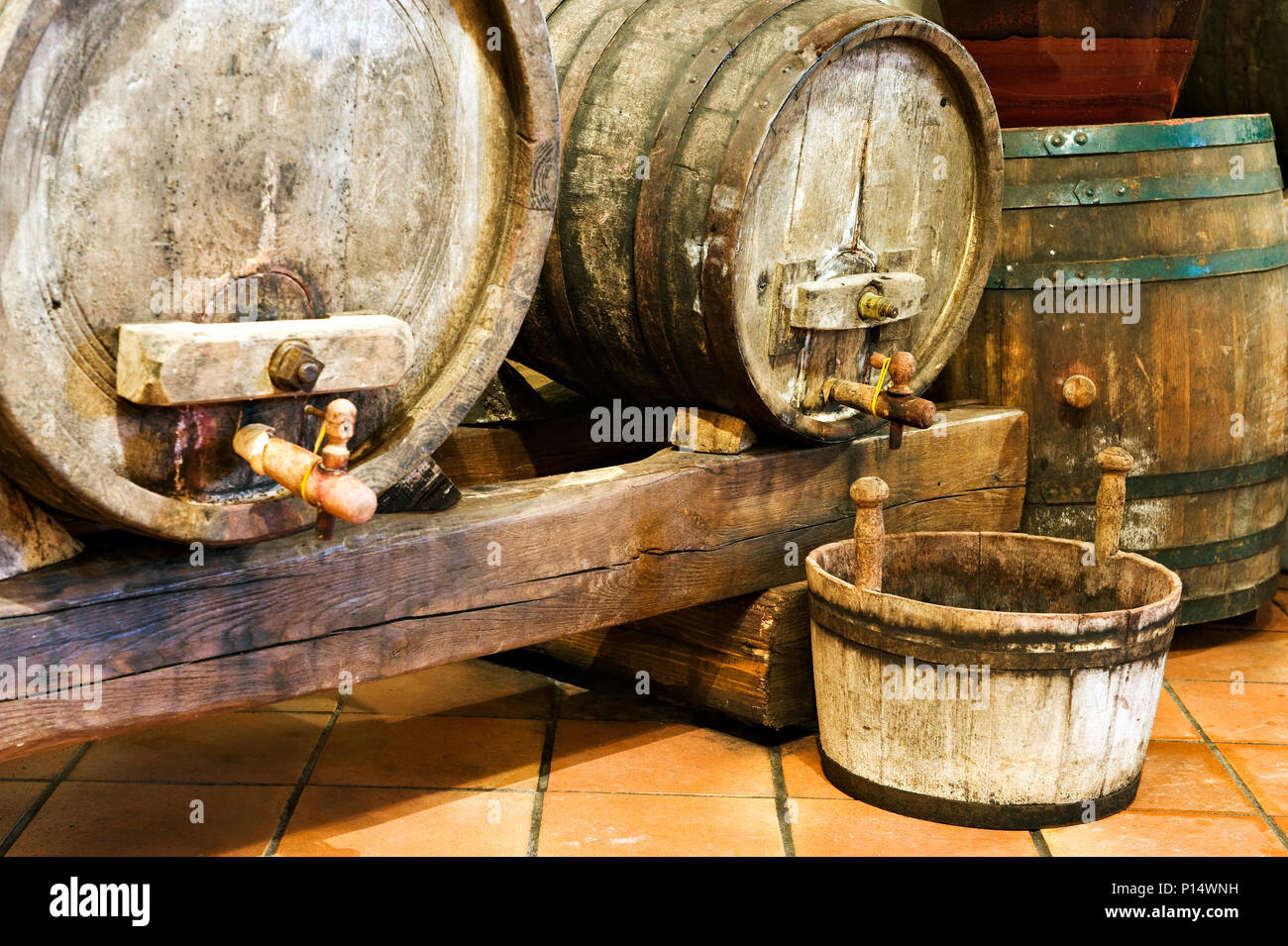 Old wine barrels in a rural wine cellar Stock Photo - Alamy