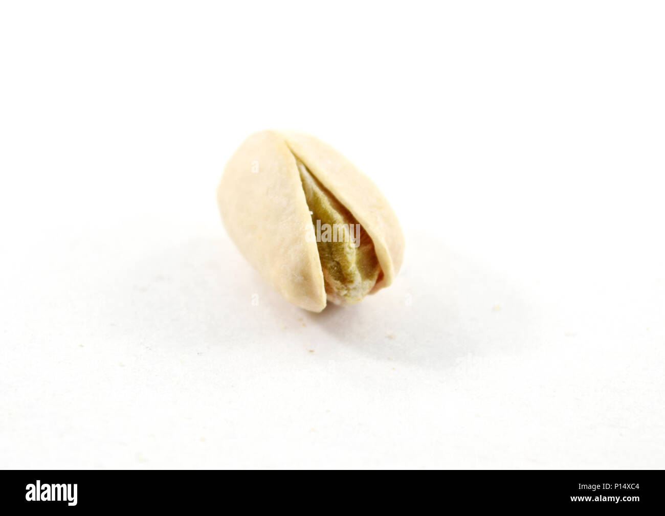 Healthy green pistachio in shell - isolated Stock Photo - Alamy