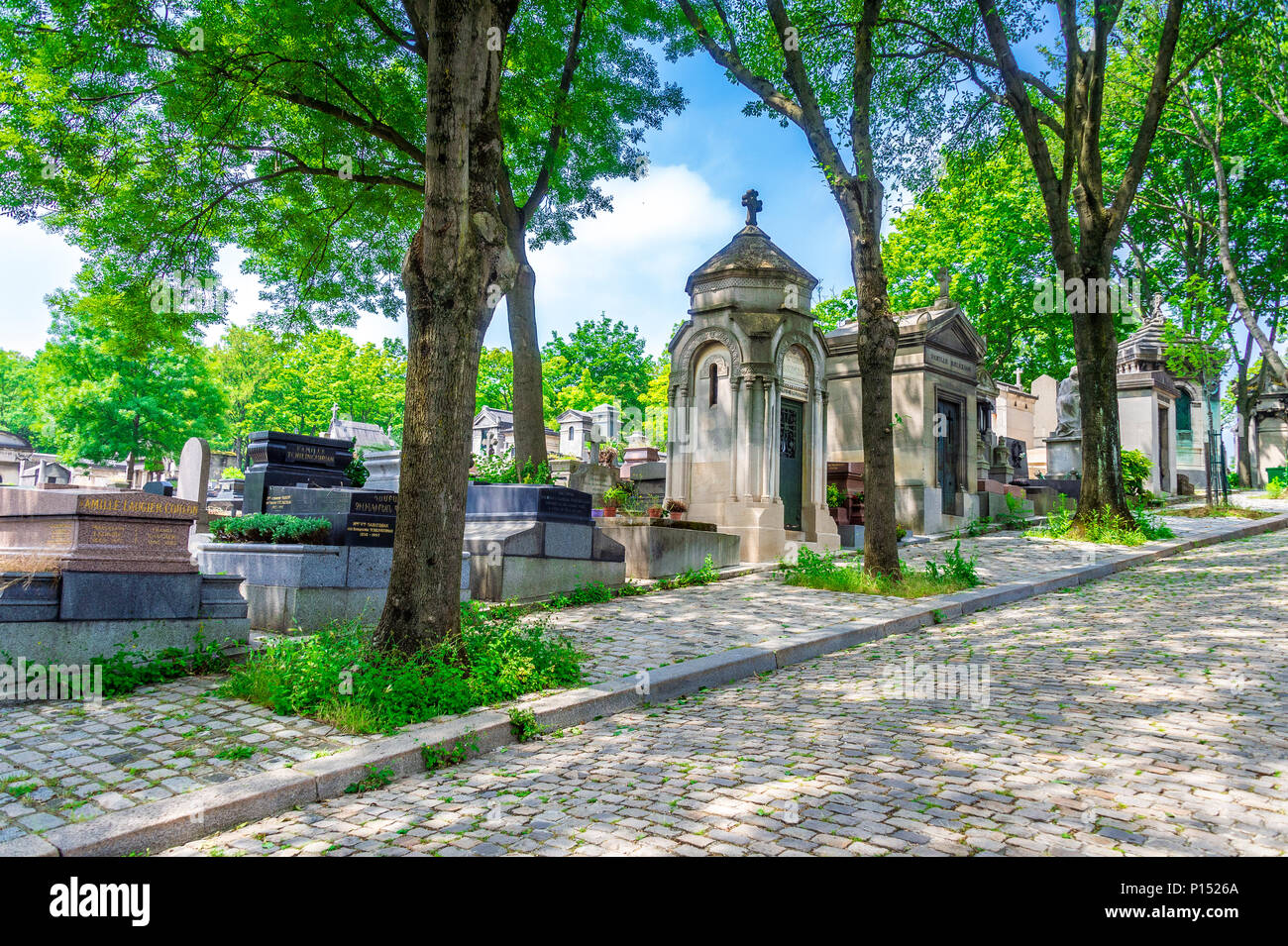 The wide, tree lined streets of Père Lachaise Cemetery are a perfect ...