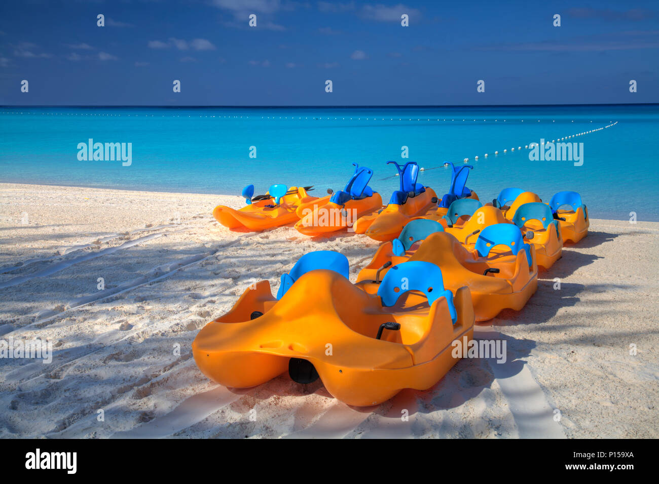The azure sea and swimming floats surround the beach Stock Photo - Alamy
