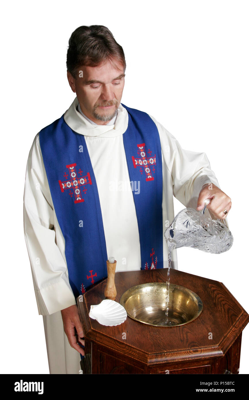 A minister prepares for a baptism ceremony with water Stock Photo - Alamy