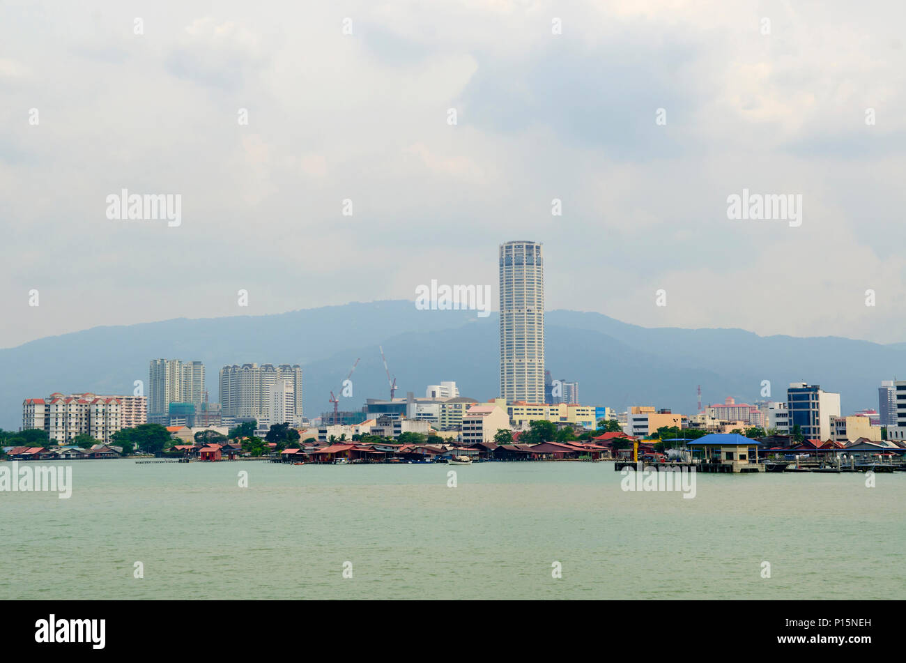 Penang cityscape with boats on ocean and skyscraper in Malaysia, Asia ...