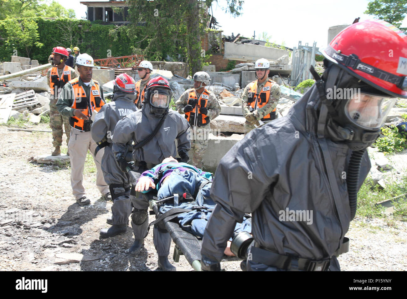 Soldiers from the 468th Fire Fighting Detachment suit up and move to ...