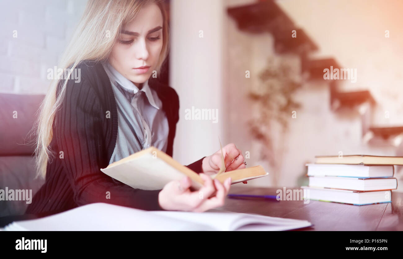Young pretty blonde girl student before class Stock Photo - Alamy