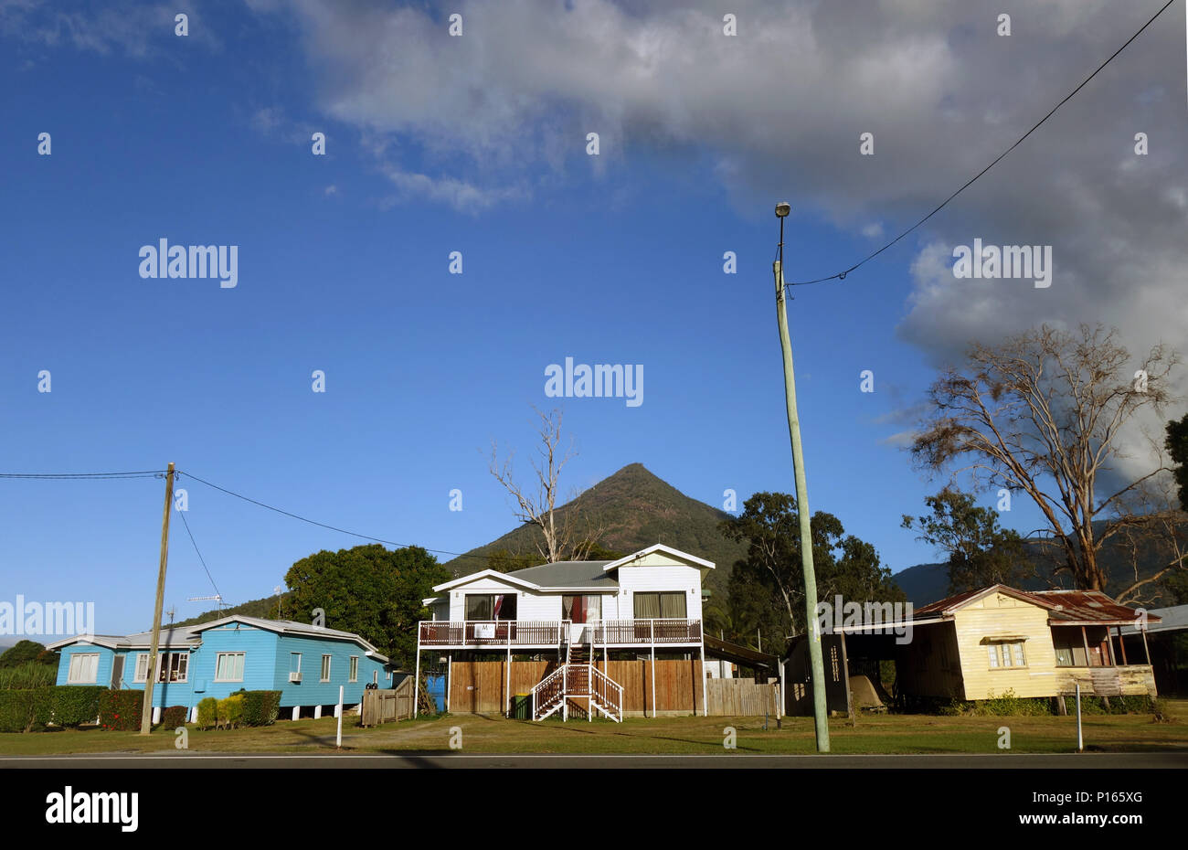 Three different generations of Queenslander houses, Gordonvale, near ...
