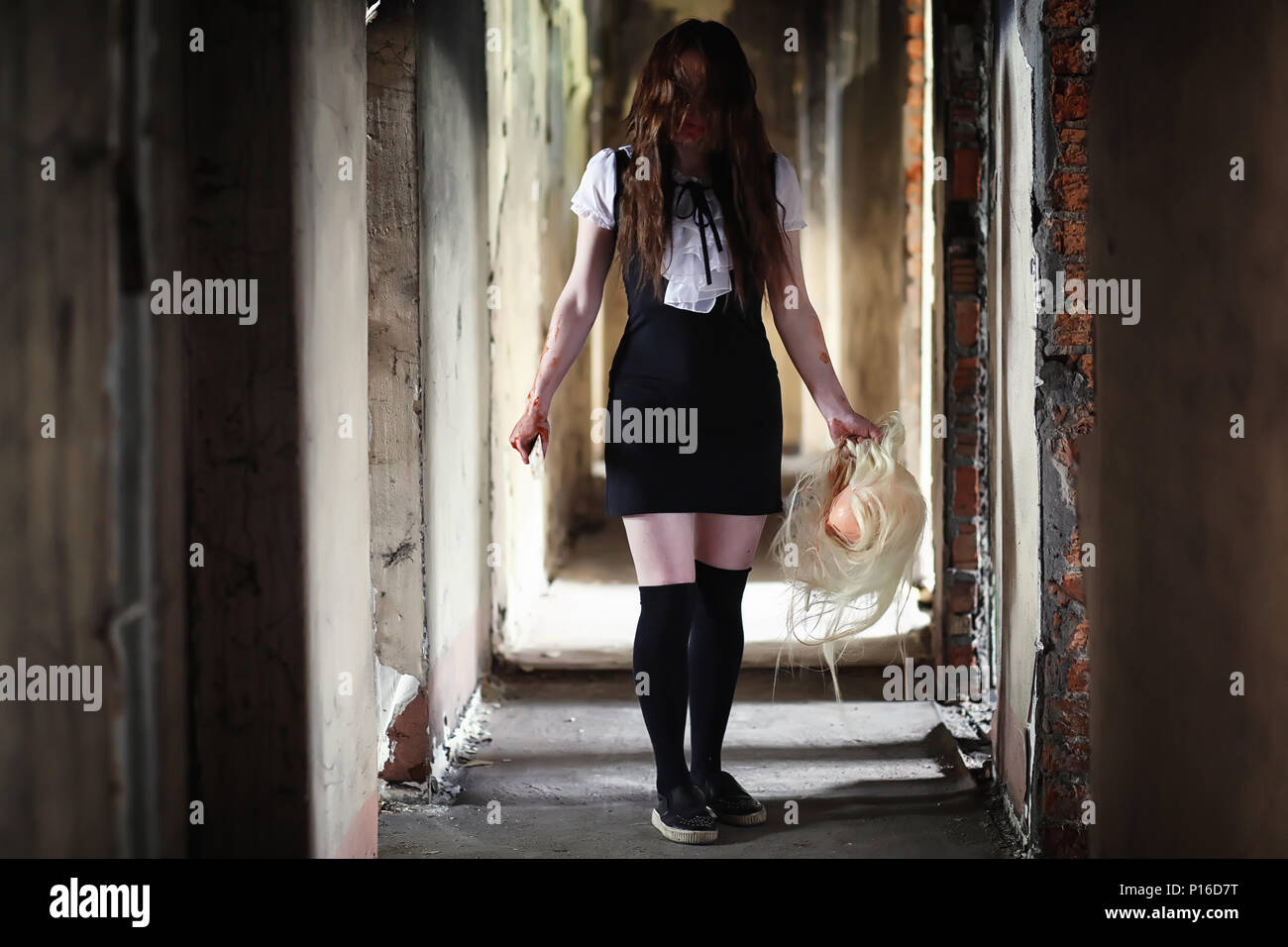 Beautiful red hair bloody girl zombie hi-res stock photography and ...