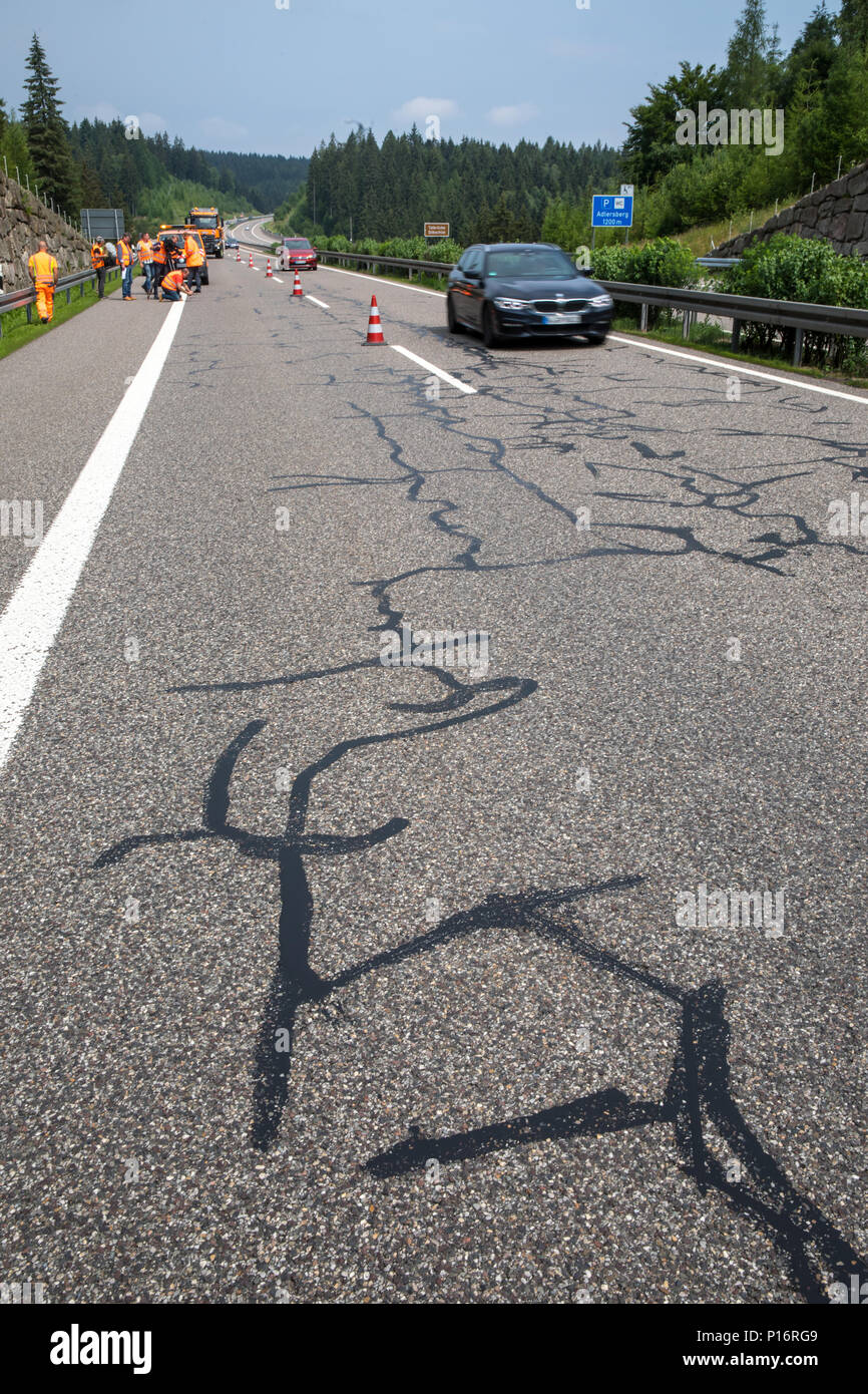 11 June 2018, Suhl, Germany: Vehicles drive by new cracks in the ...