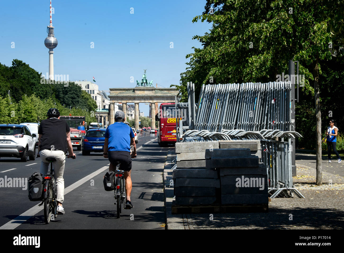 11 June 2018, Germany, Berlin: Crowd barriers are next to the street ...