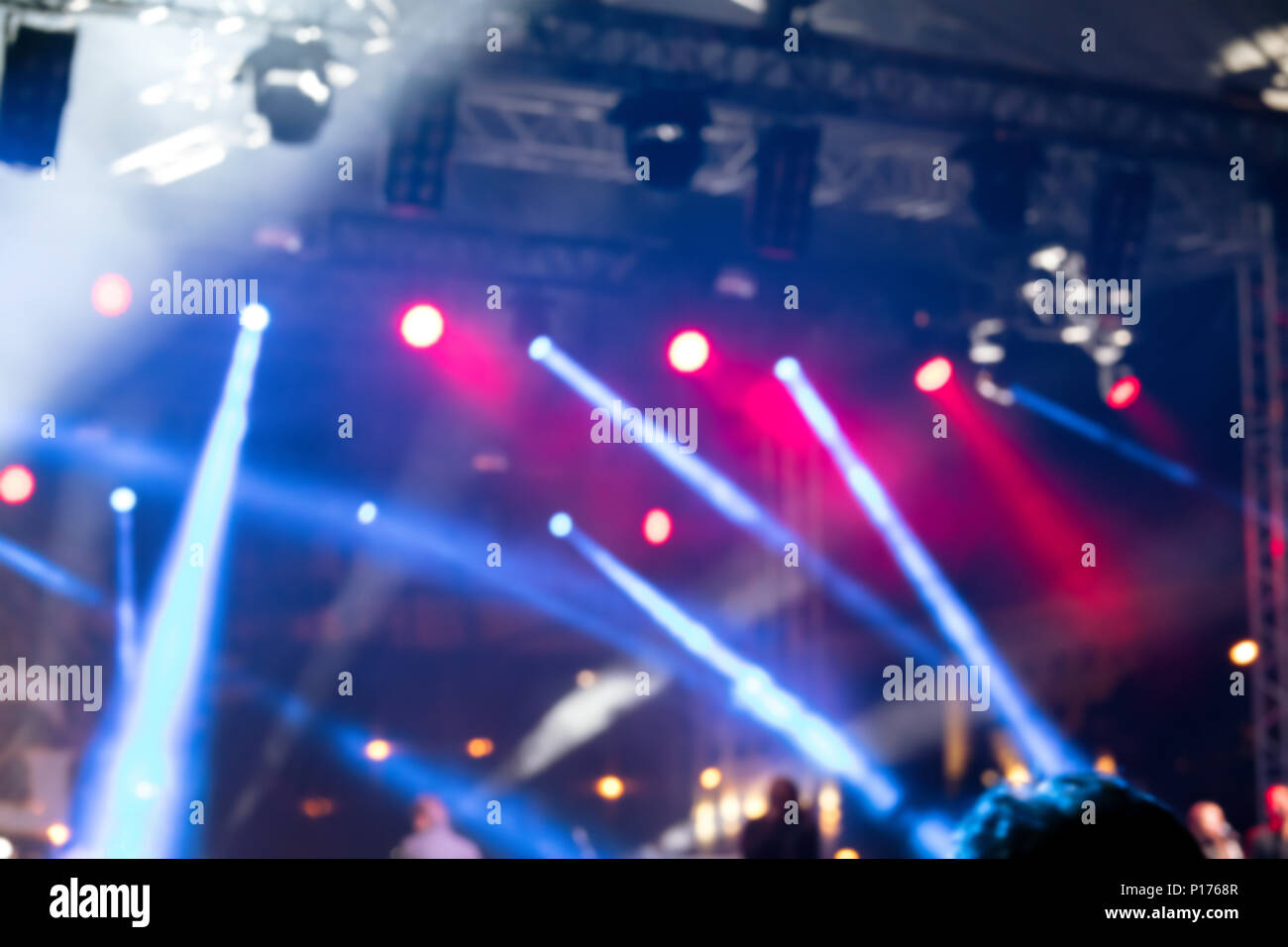 blurred blue stage lights and audience during the outdoor concert Stock ...