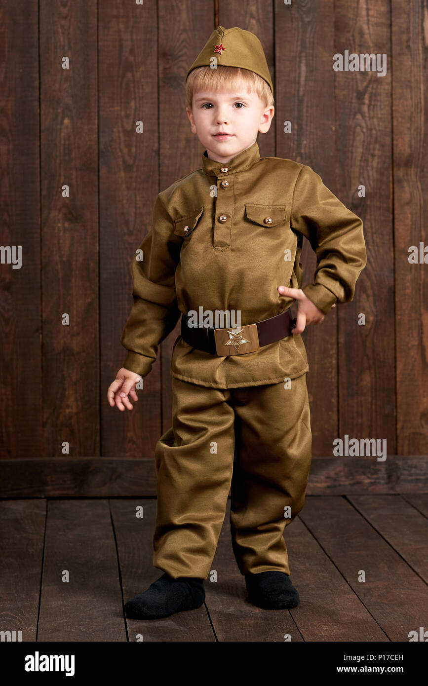 children are dressed as soldier in retro military uniforms Stock Photo ...