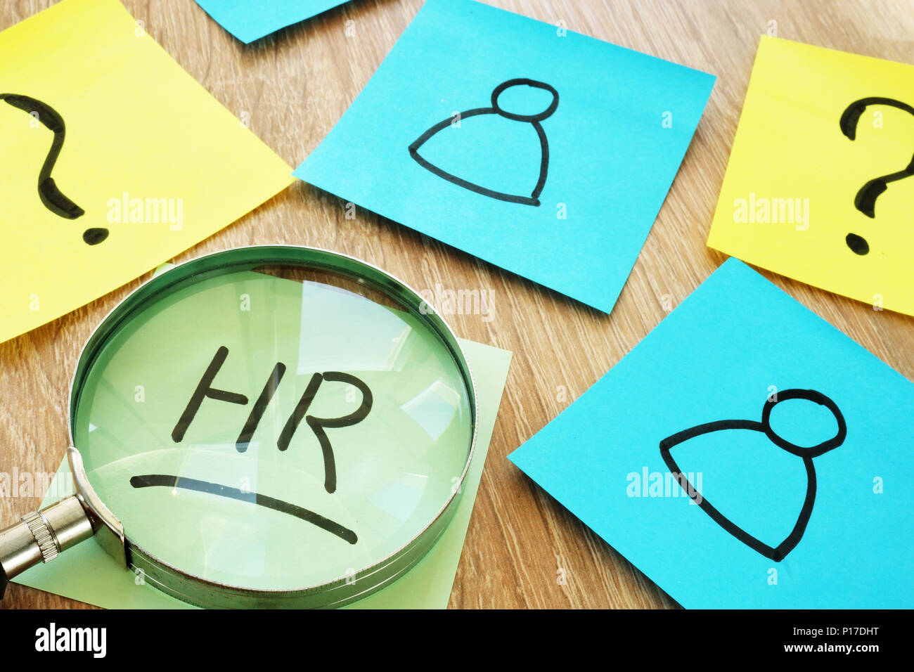 HR human resource written on a stick and magnifier Stock Photo - Alamy