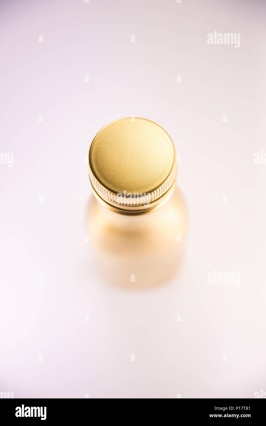 Gold plastic bottle Stock Photo - Alamy