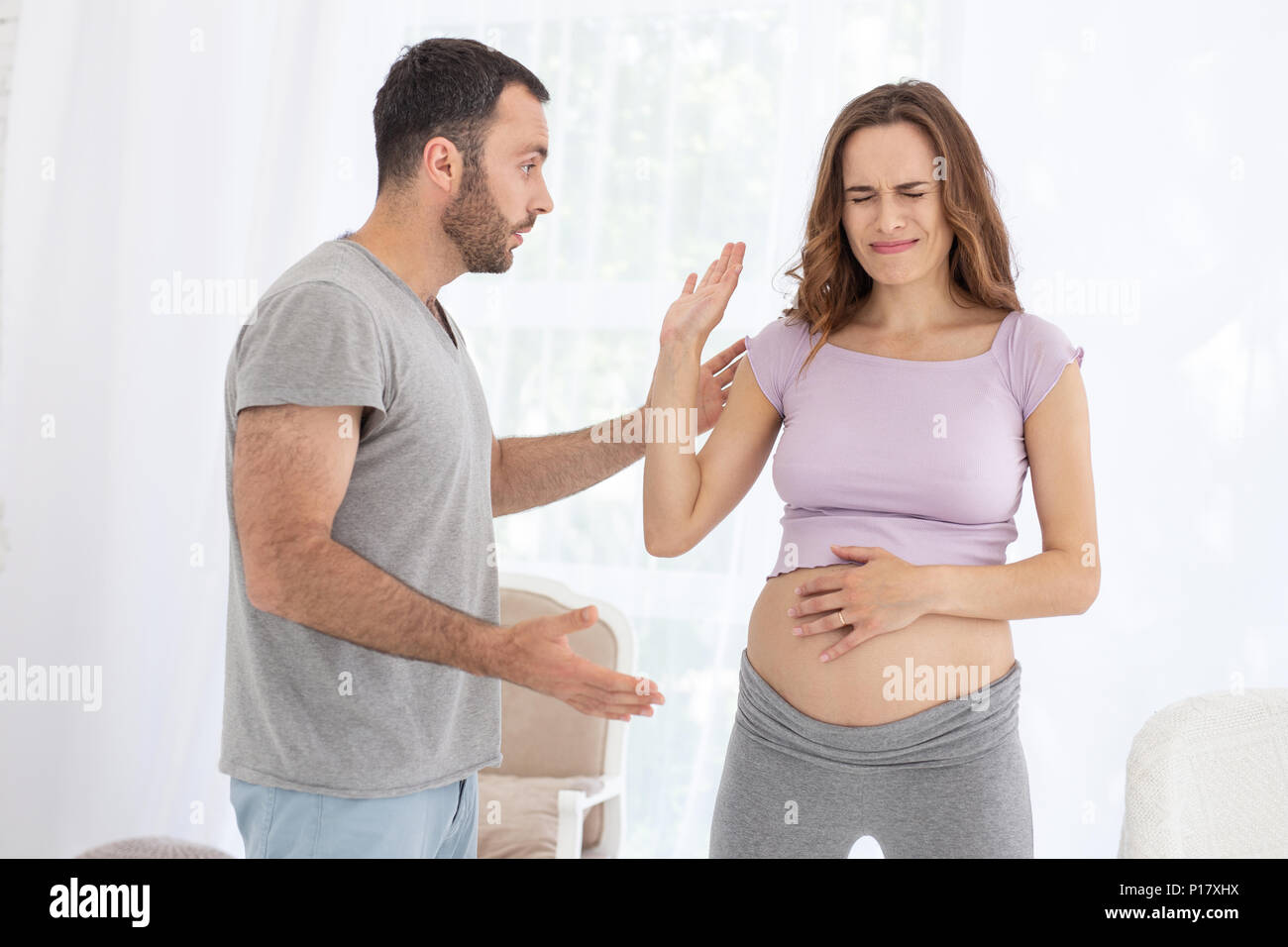 Woman pregnant man unhappy hi-res stock photography and images - Alamy
