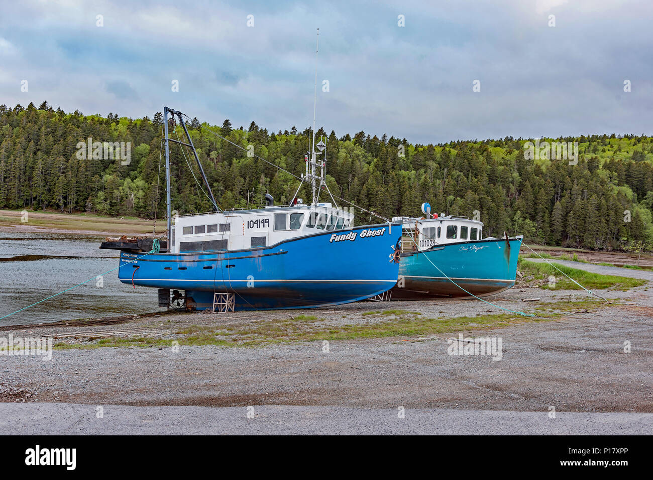 Alma, New Brunswick lobster boats at low tide Stock Photo - Alamy