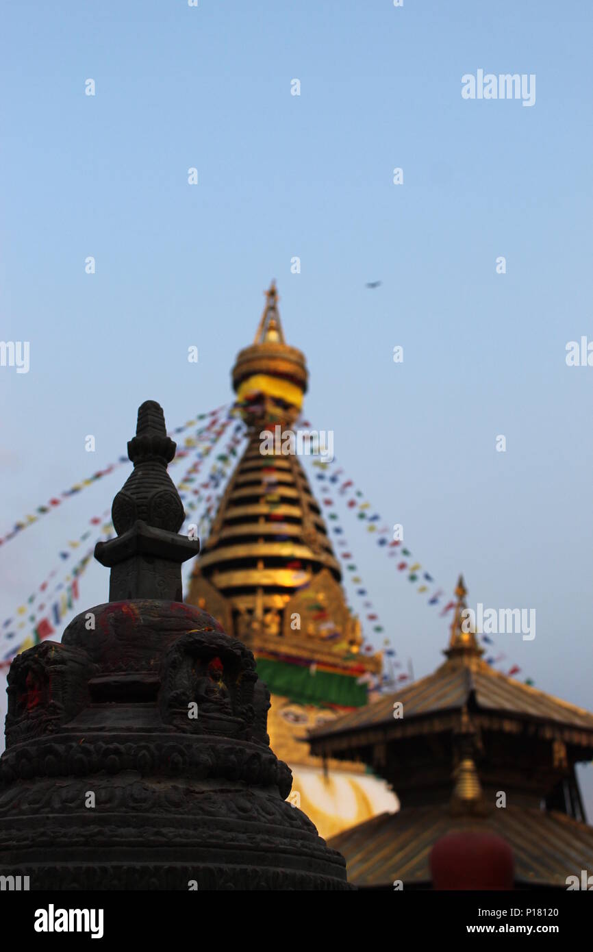Swyambhunath Stupa behind Small Buddha stupa Stock Photo - Alamy