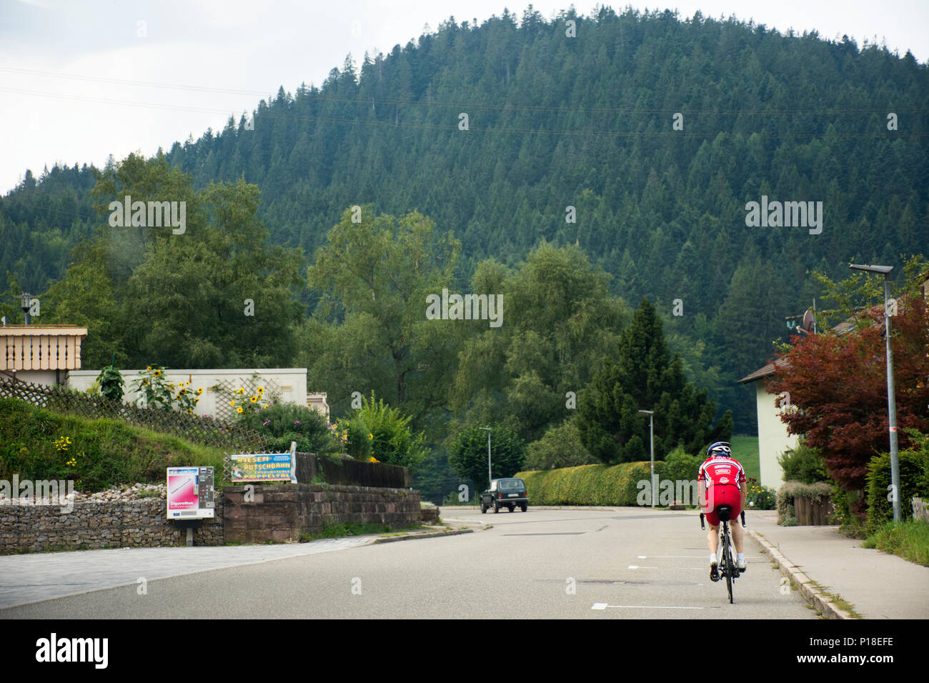 German people riding bicycle practice the race on the road in Besenfeld ...