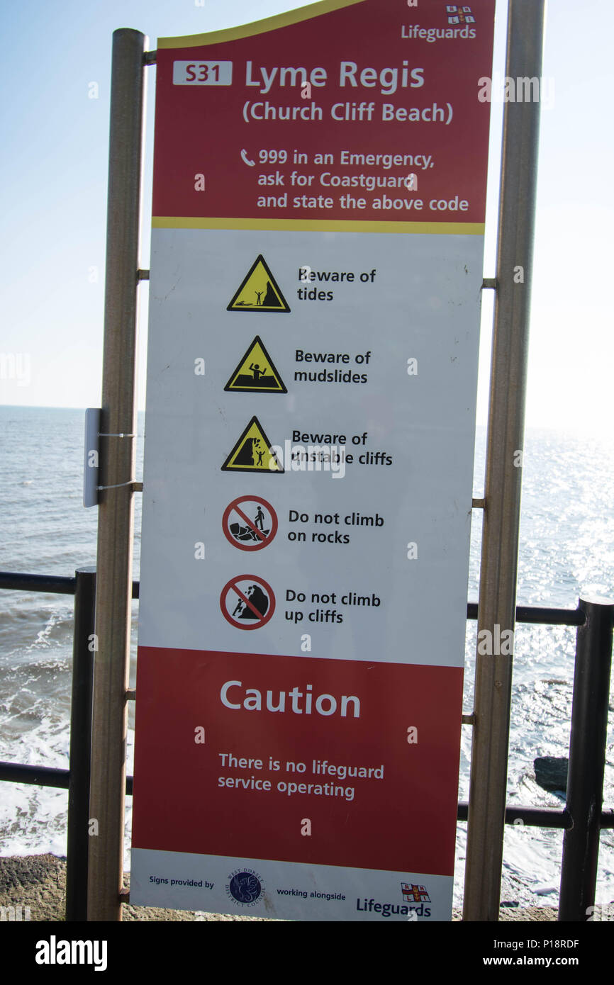 Lime Regis Church Cliff Beach sign caution 999 coastguard no climbing ...