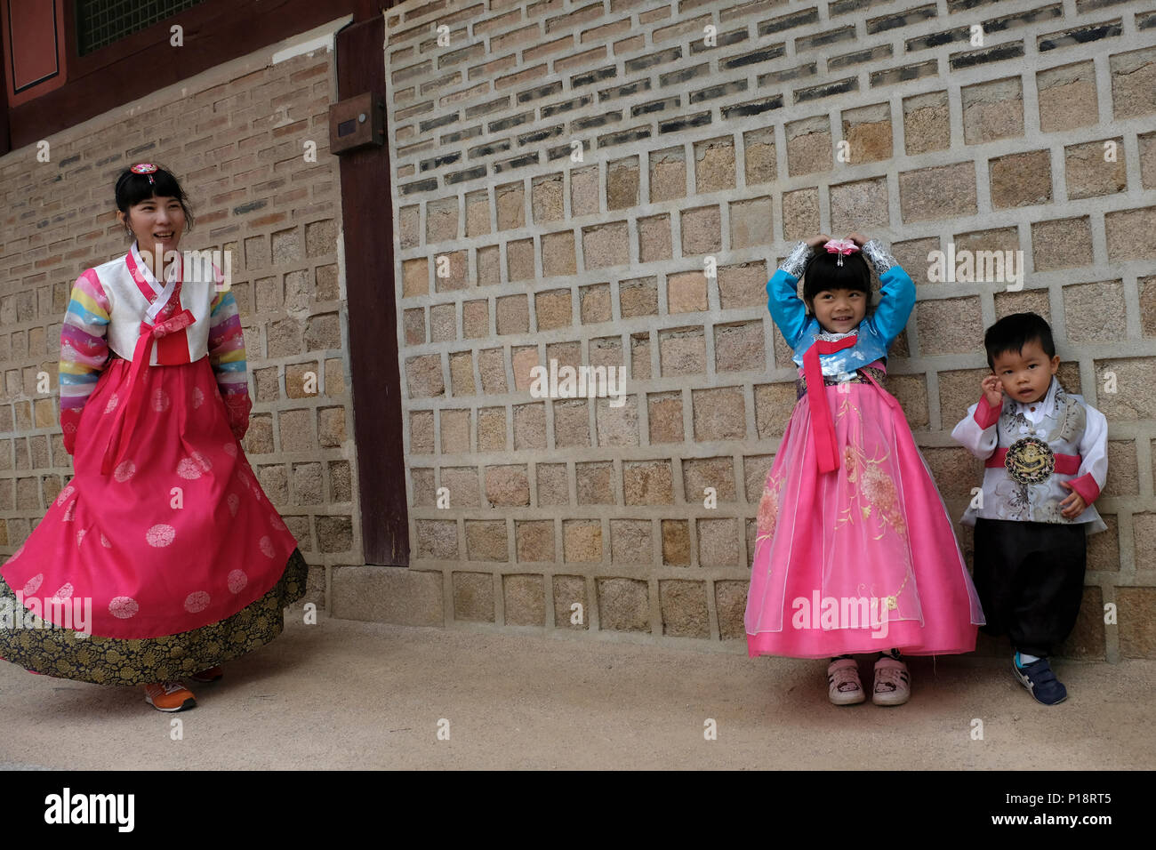 Young Korean children in traditional costumes at Gyeongbokgung or ...