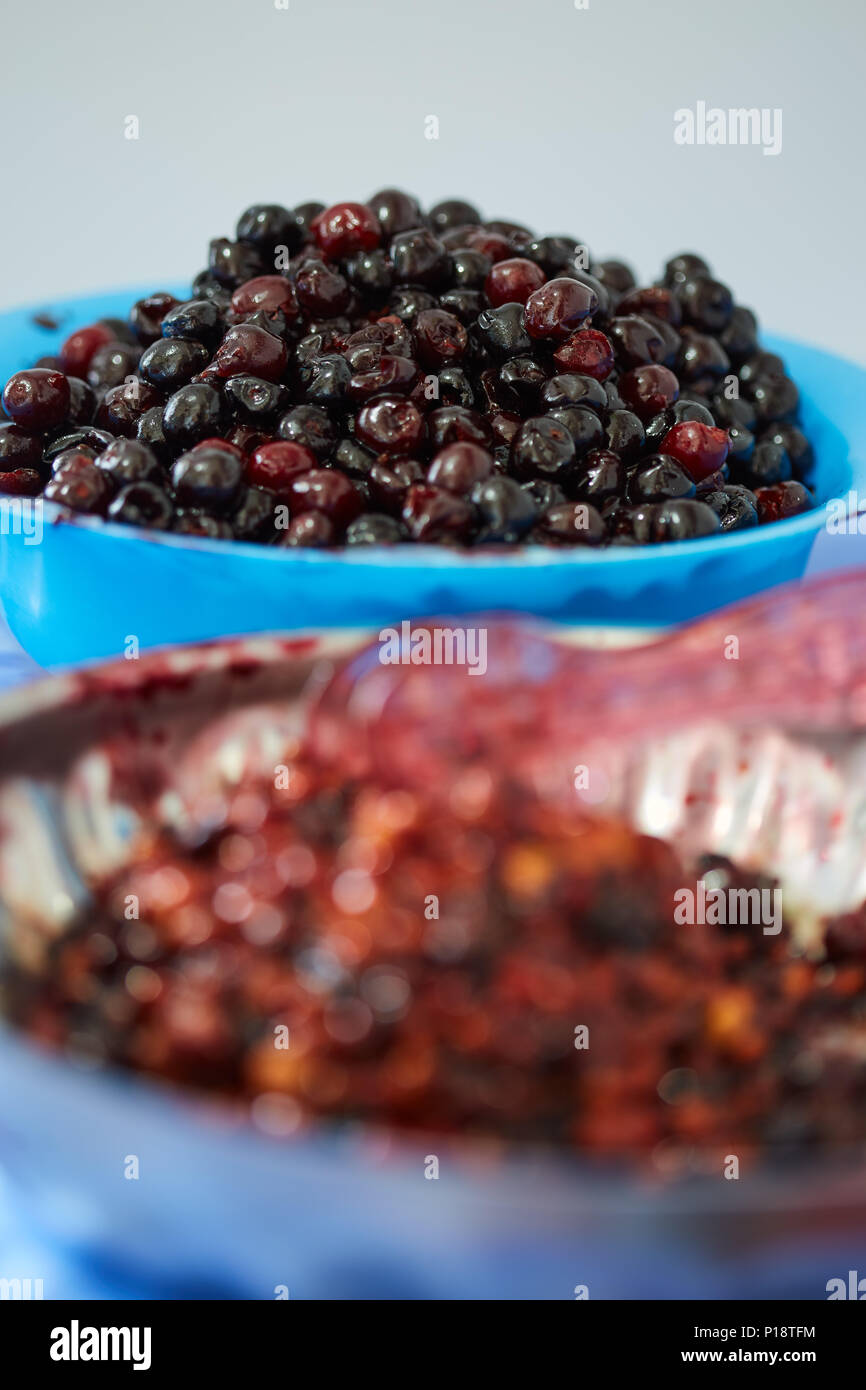 Pitted black bitter wild cherries ready to be turned into jam or ...