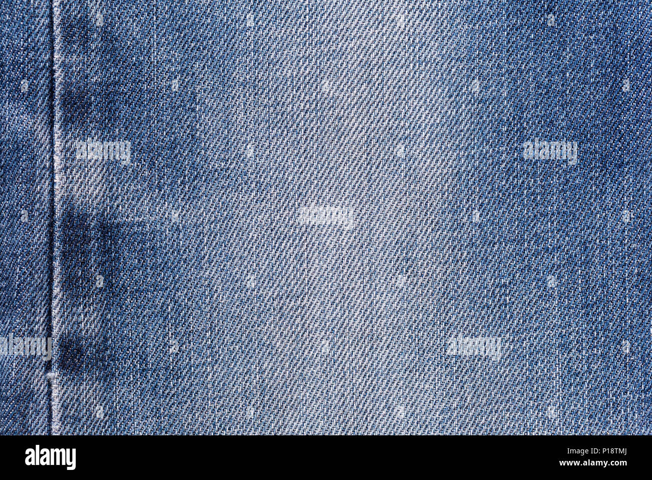 Denim jeans fabric texture background with seam for clothing, fashion ...