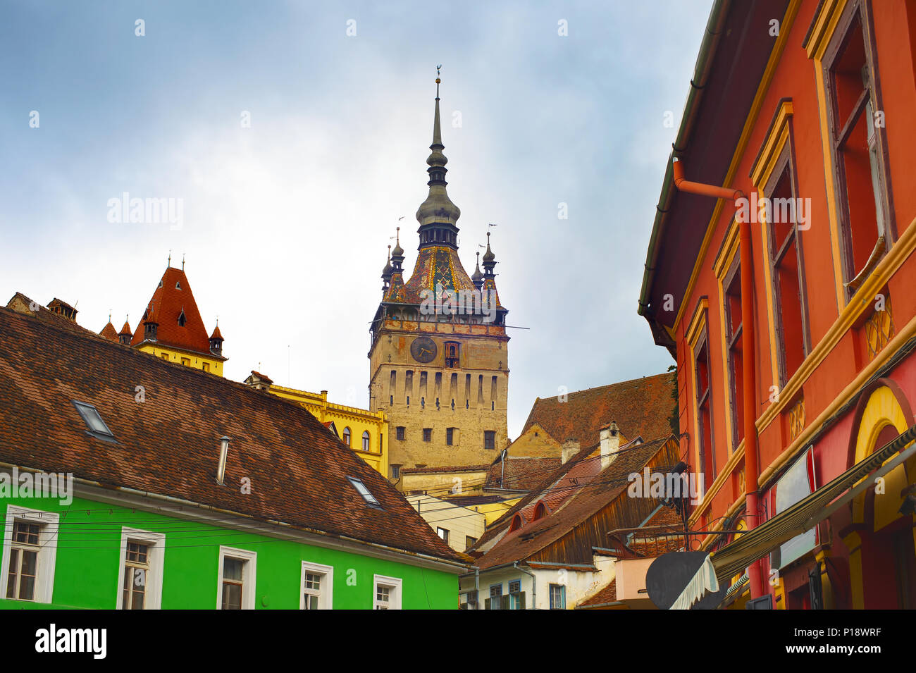 View of Sighisoara Clock Tower in the rainy day. Romania Stock Photo ...