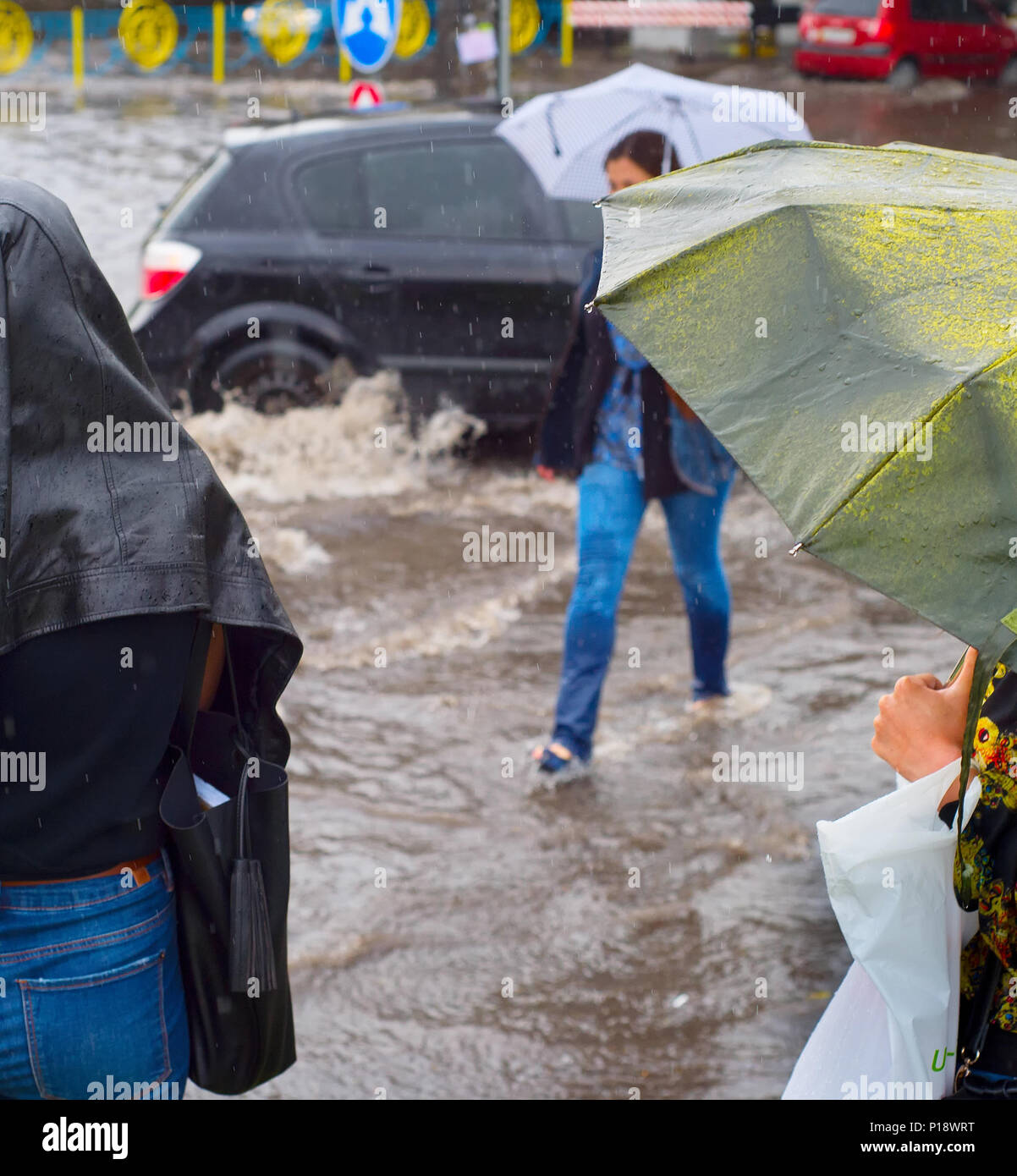 People crossing flooded river hi-res stock photography and images - Alamy