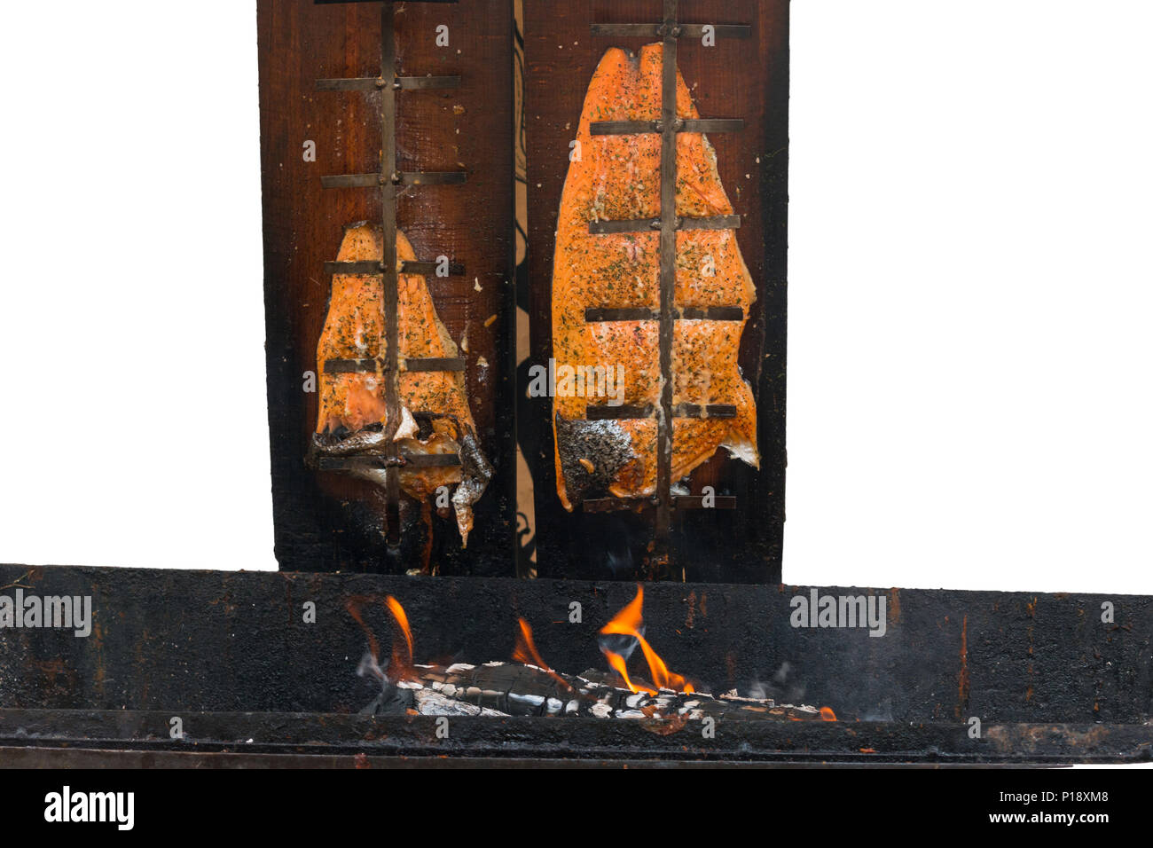 Preparation for smoking salmon over an open fire Stock Photo - Alamy