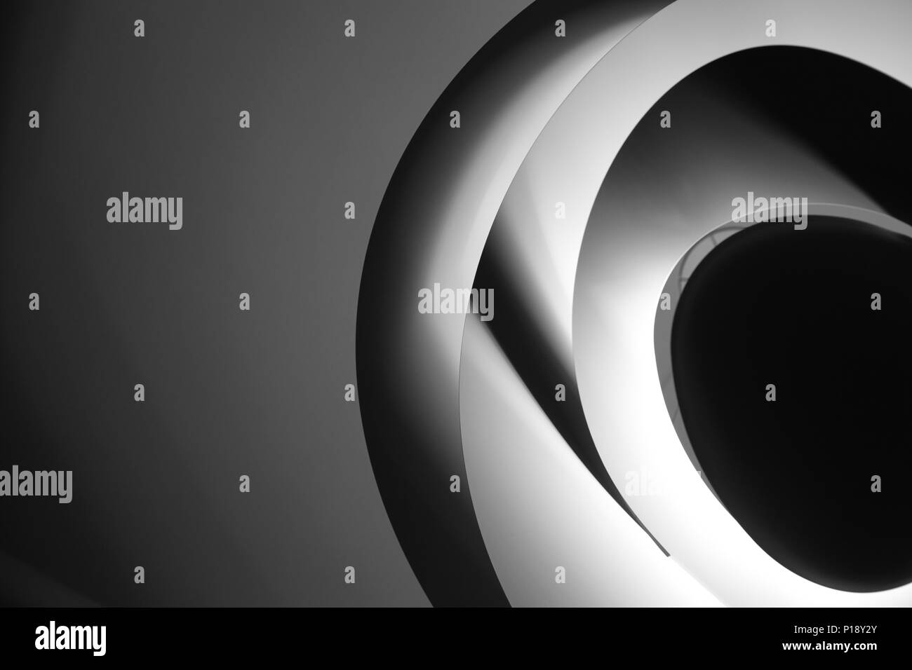 Abstract architectural ceiling, curves and round lines illuminated by ...