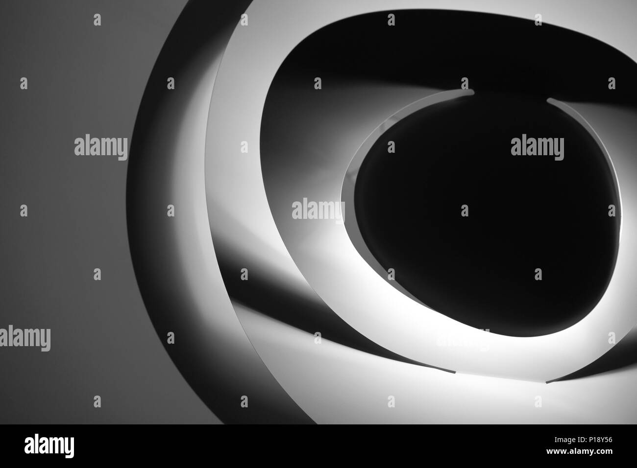 Abstract architectural ceiling, curves and round lines illuminated by ...