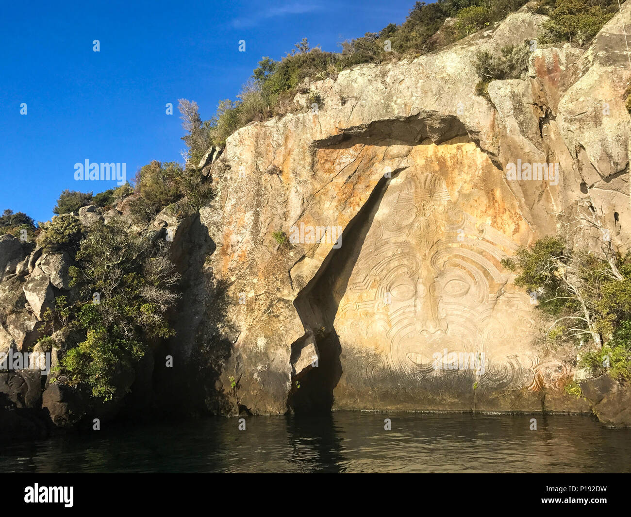 Maori Rock Carvings on Lake Taupo, New Zealand Stock Photo - Alamy