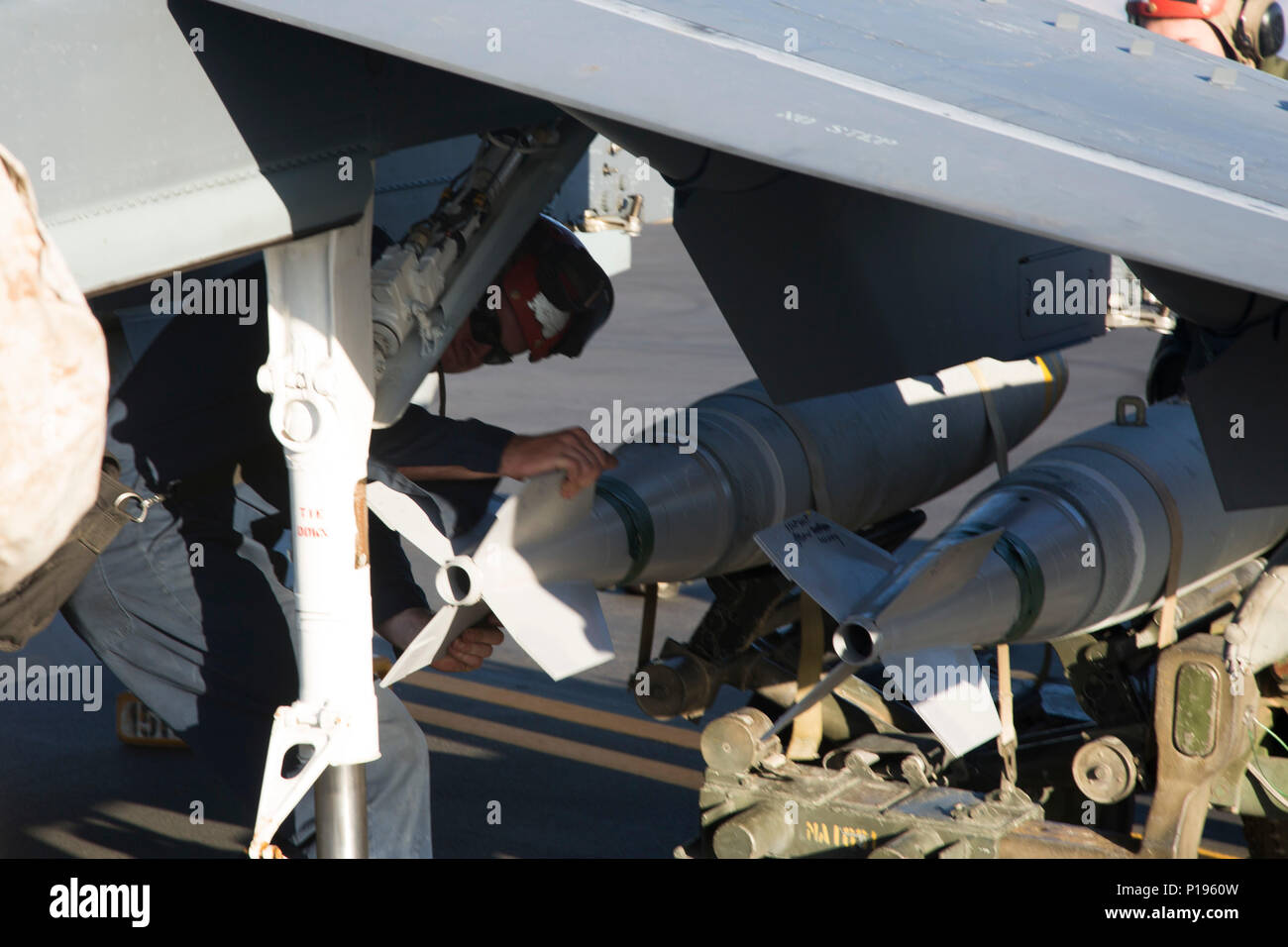 A U.S. Marine with Marine Wing Support Squadron (MWSS) 372 prepares to ...