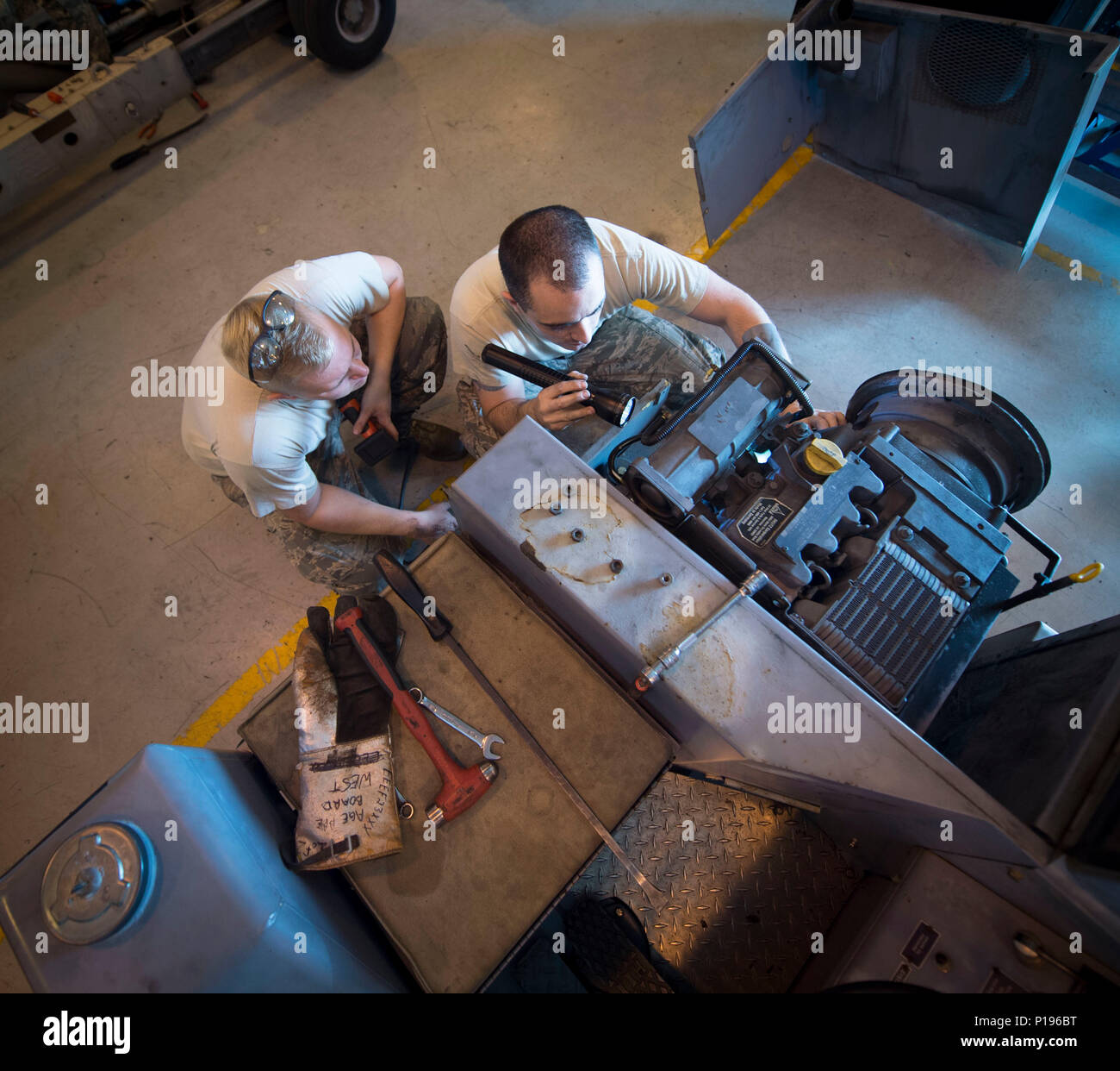 Senior Airman Miles Shepperd, left, an aerospace ground equipment ...