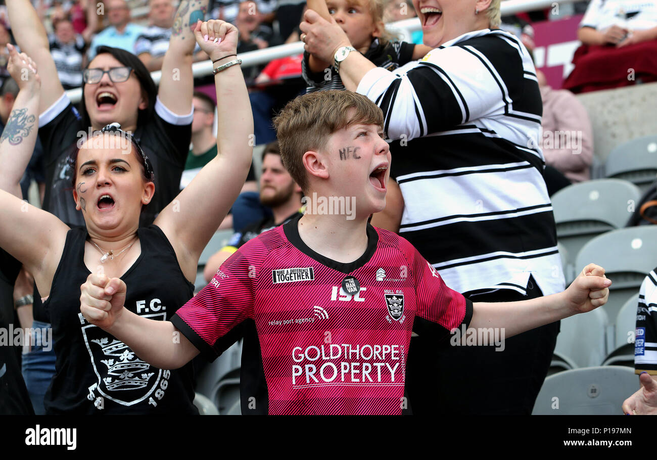 Hull fc fans celebrate the opening try in the stands Stock Photo - Alamy