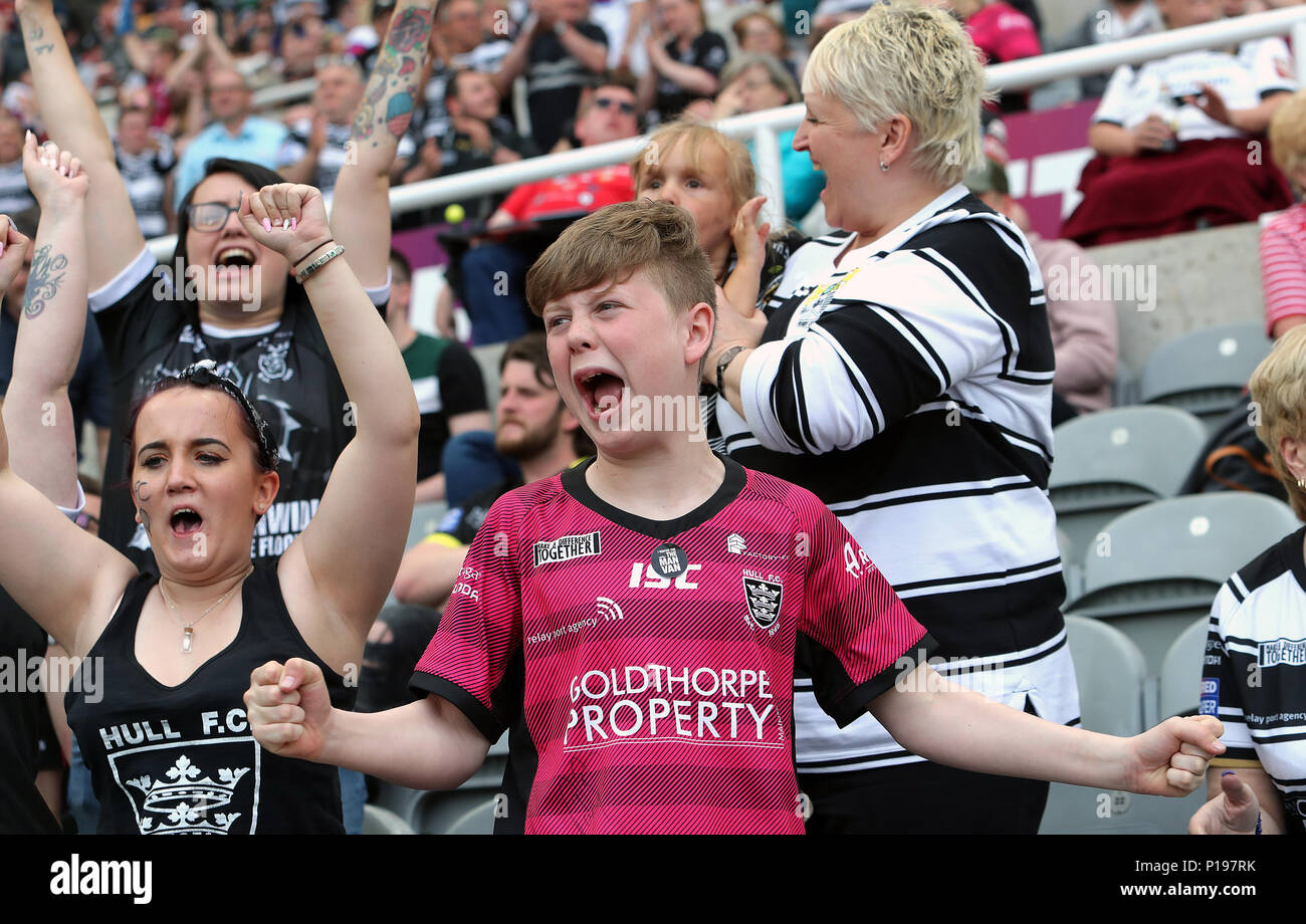 Hull fc fans celebrate the opening try in the stands Stock Photo - Alamy